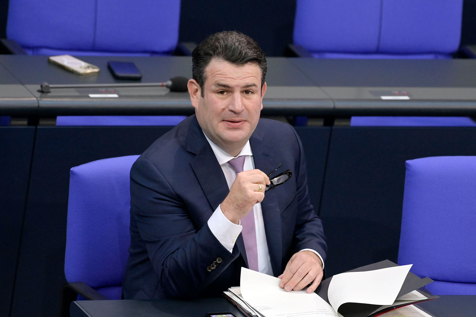 “Opening doors and hearts” Hubertus Heil emigrate skilled workers Germany